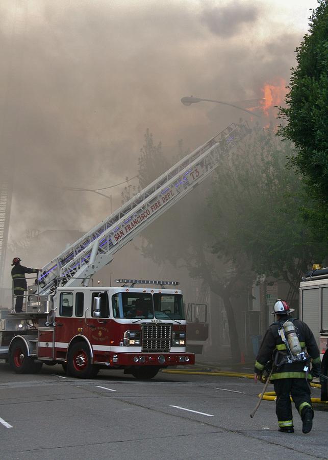 SFFD working a fire Photograph by Marcel Van Gemert - Fine Art America