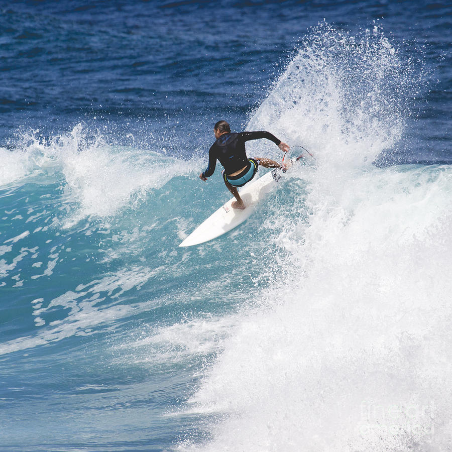 Extreme surfer riding giant ocean wave in Hawaii Photograph by Mariusz ...