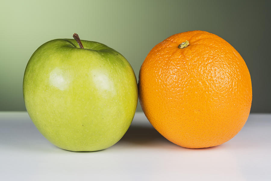 Apple and Orange Contrast Theme Photograph by Vishwanath Bhat - Pixels