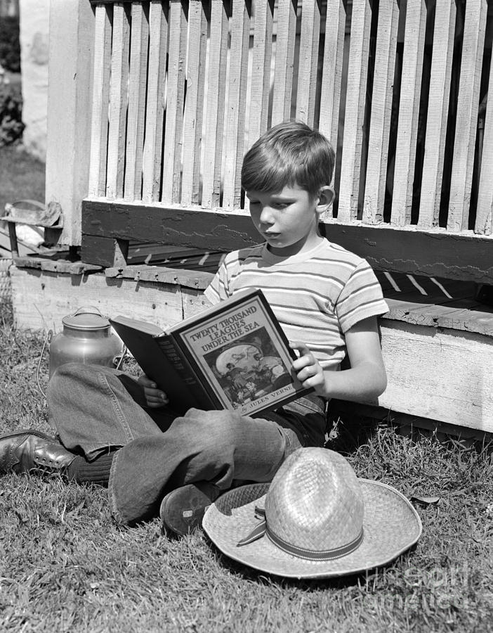Boy Reading Outside, C.1940s Photograph by H. Armstrong Roberts ...