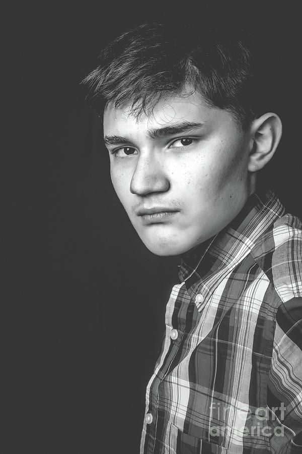 Brooding youth Photograph by Chellie Bock - Fine Art America