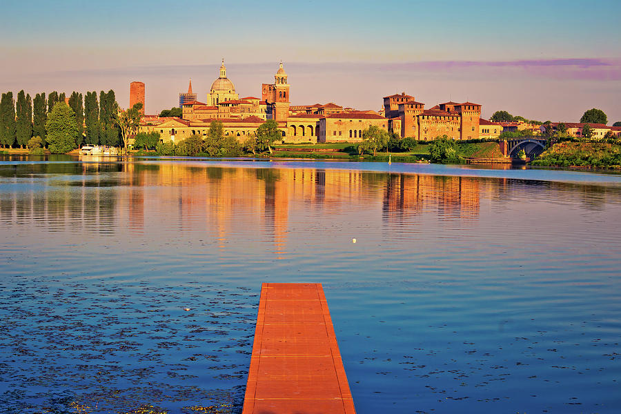 City of Mantova skyline early morning view from lago Inferiore ...