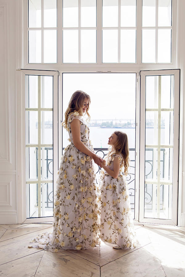 Mother And Daughter In Matching Dresses Standing Photograph By Elena