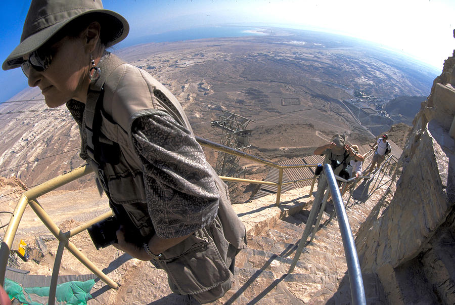 Visitors explore Masada in Israel Photograph by Carl Purcell - Fine Art America