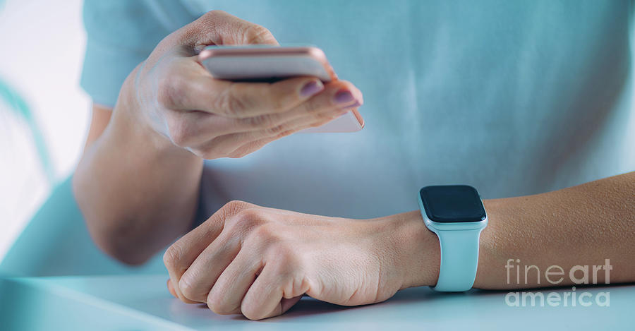 Measuring Heart Rate Using Smart Phone And Smart Watch Photograph by ...