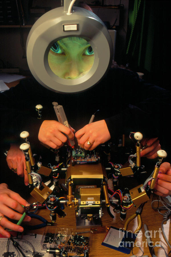 Repairs To A Robot Insect At Mit Robotics Lab Photograph by Peter ...