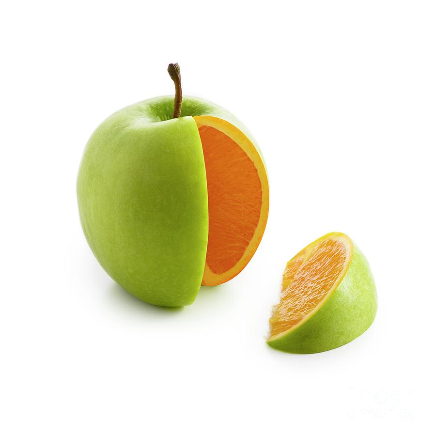 Segment Cut From Apple Showing Orange Inside Photograph by Science ...