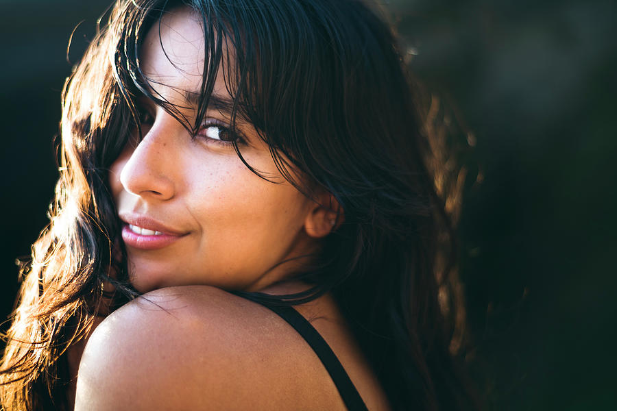 Young Latina Woman Portrait At Golden Hour In Summertime Photograph By Cavan Images Fine Art
