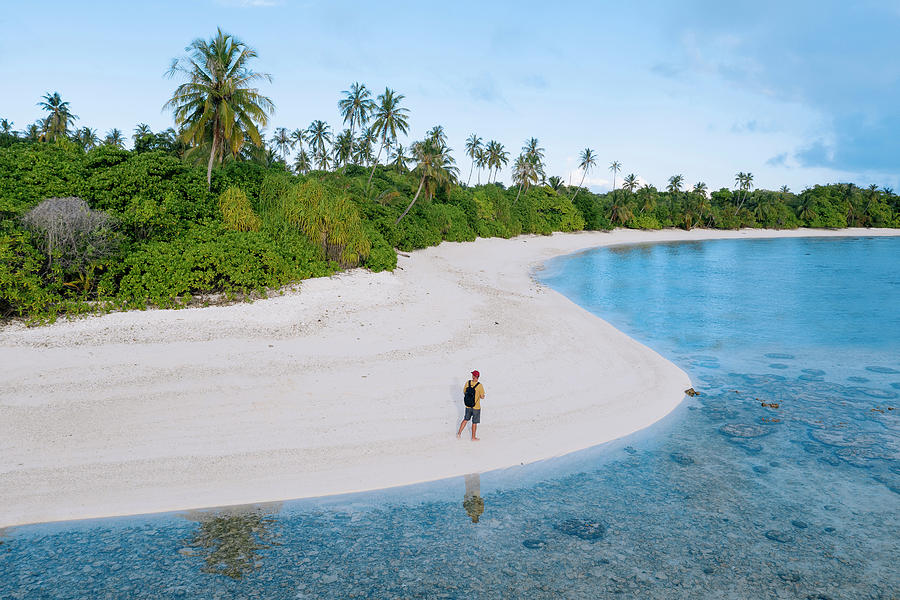 Aerial View Of Man Standing At The Beach #15 Photograph by Cavan Images / Konstantin Trubavin ...