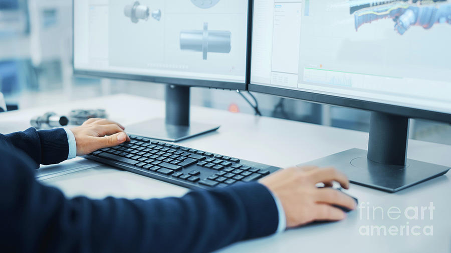 Industrial Engineer Using A Computer Photograph by Gorodenkoff ...