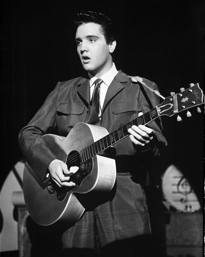 Elvis Presley Singing And Playing Guitar Photograph By Globe Photos Pixels