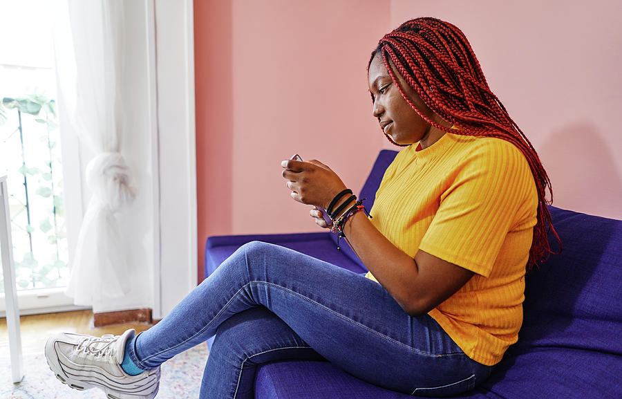 Portrait Of African American Woman Talking On The Phone Photograph By Cavan Images Adalberto
