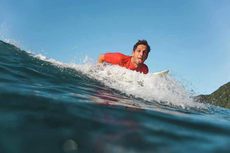 Surfer In Sea, Sumbawa, Indonesia Photograph by Konstantin Trubavin | Fine Art America