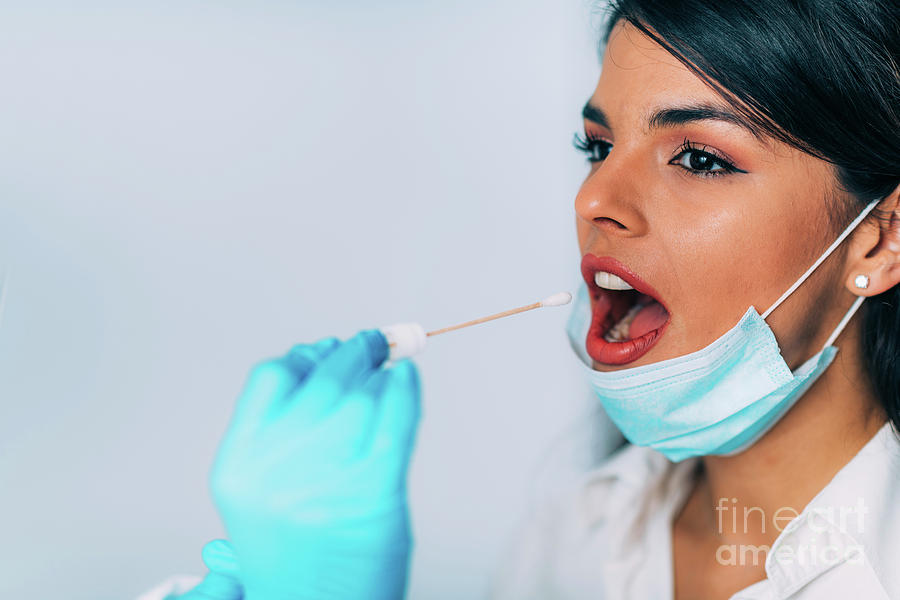 Medical Worker Taking Swab For A Coronavirus Test Photograph by ...