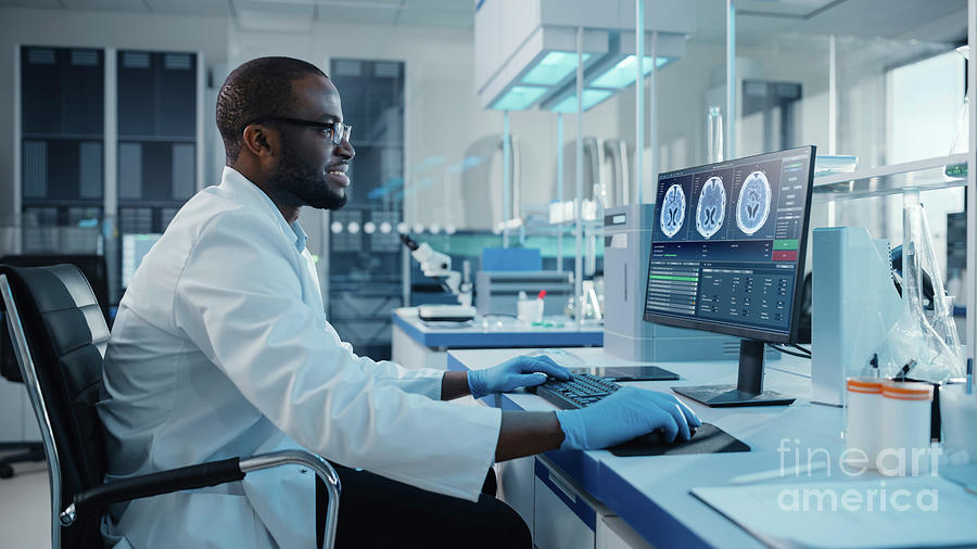 Scientist Using A Computer In A Laboratory Photograph by Gorodenkoff ...