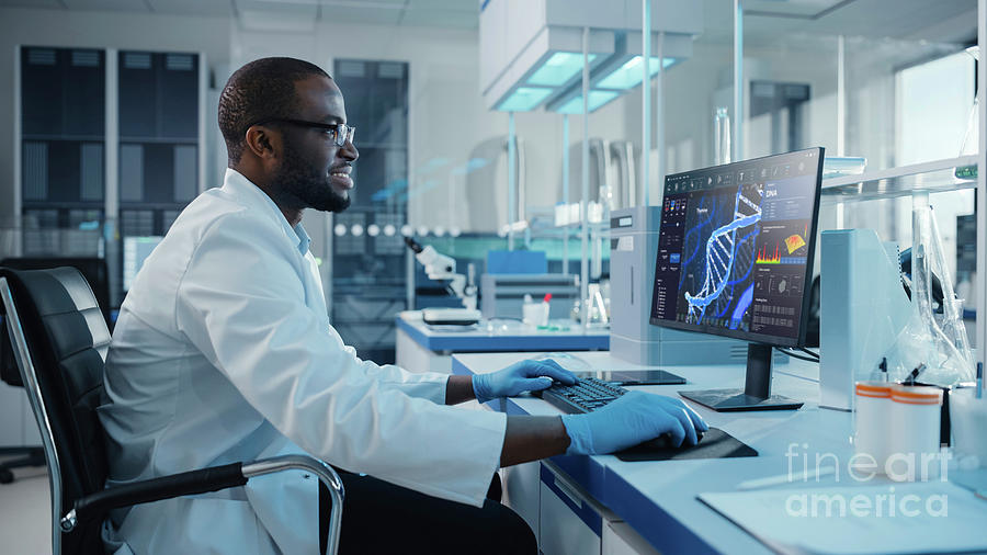 Scientist Using A Computer In A Laboratory Photograph by Gorodenkoff ...