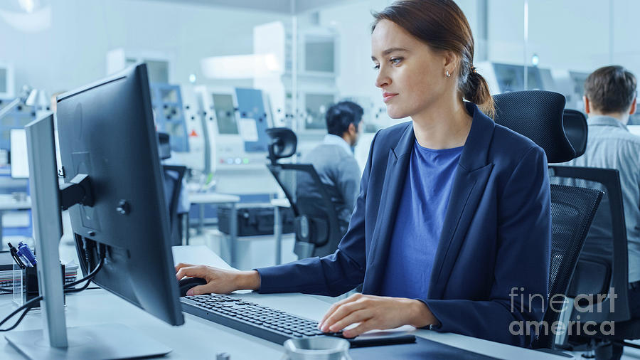Engineer Working On A Computer Photograph by Gorodenkoff Productions ...