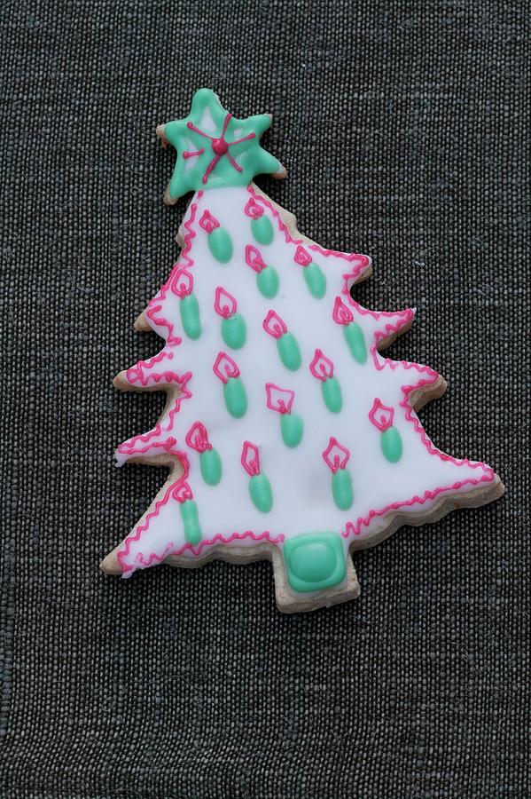 A Decorated Biscuit In The Shape Of A Christmas Tree Photograph by Food ...