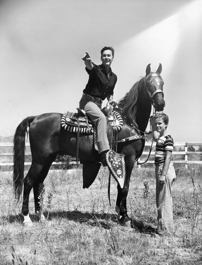 Actor Errol Flynn And Son While By Bettmann