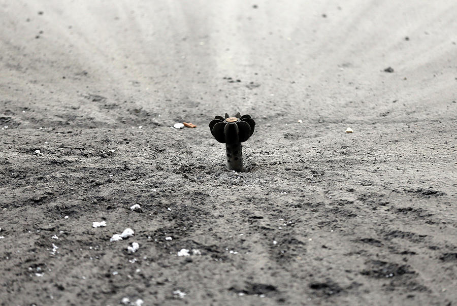 An Unexploded Mortar Shell Fired Photograph by Goran Tomasevic - Fine ...