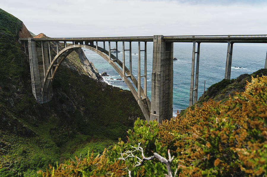 Arch Bridge Over Mountains By Sea Photograph by Cavan Images - Fine Art ...