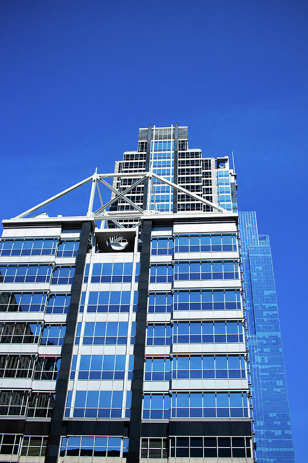 Blue Building Photograph by Hugo Acosta - Pixels