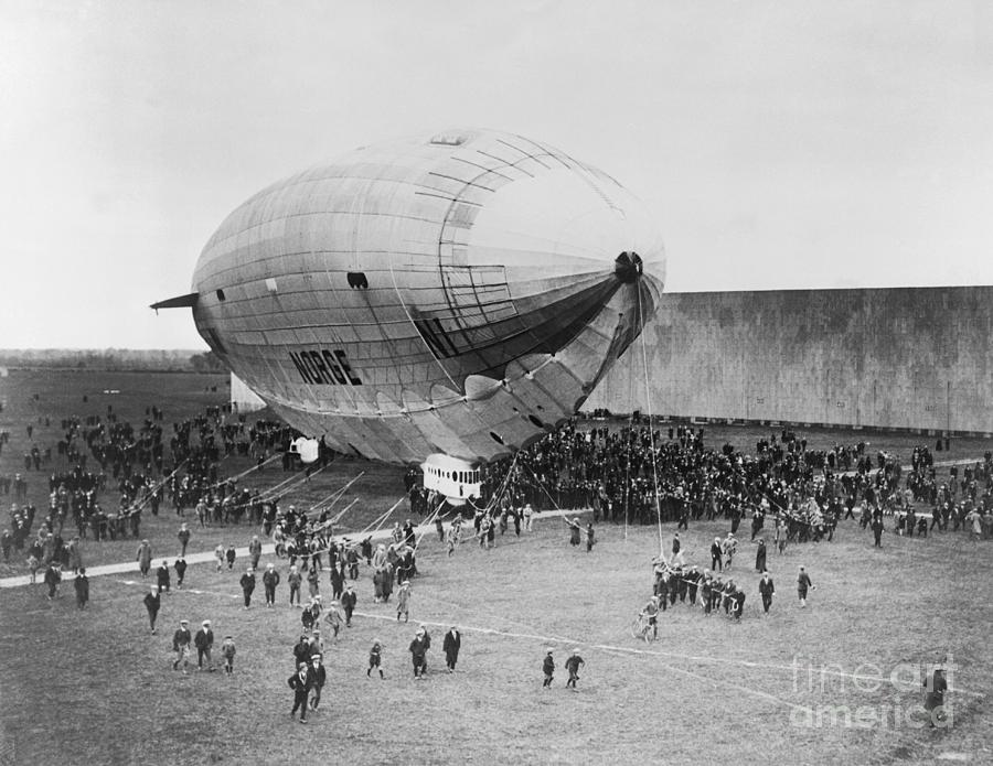 Crowd Helps Pull Norge Dirigible by Bettmann