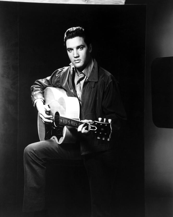 Elvis Presley Playing Guitar Photograph By Globe Photos Pixels