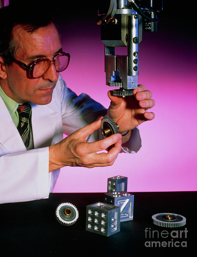 Engineer Adjusting A Robot Gripper Arm Photograph by Simon Fraser ...