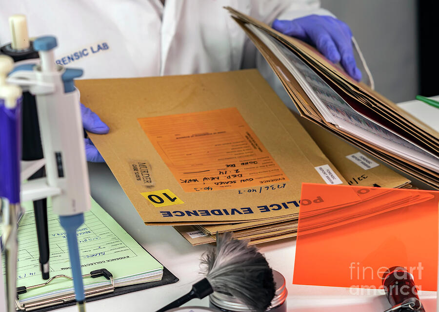 Evidence Files In Forensics Lab by Digicomphoto/science Photo Library