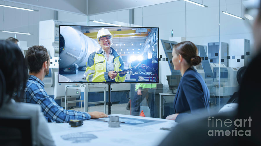 Group Of Workers In A Factory Office Meeting by Science Photo Library
