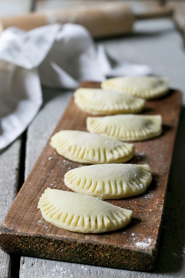 Homemade Potato Pasties Photograph by Denise Renée Schuster - Fine Art ...