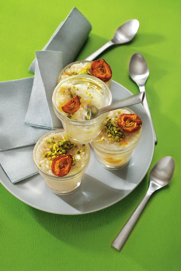 Individual Rice Puddings With Dried Apricots And Pistachios Photograph ...