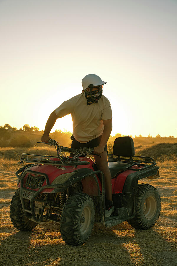 Male Quad Bike Rider Ready For Action In Cappadocia Photograph by Cavan Images / Caio Faria ...