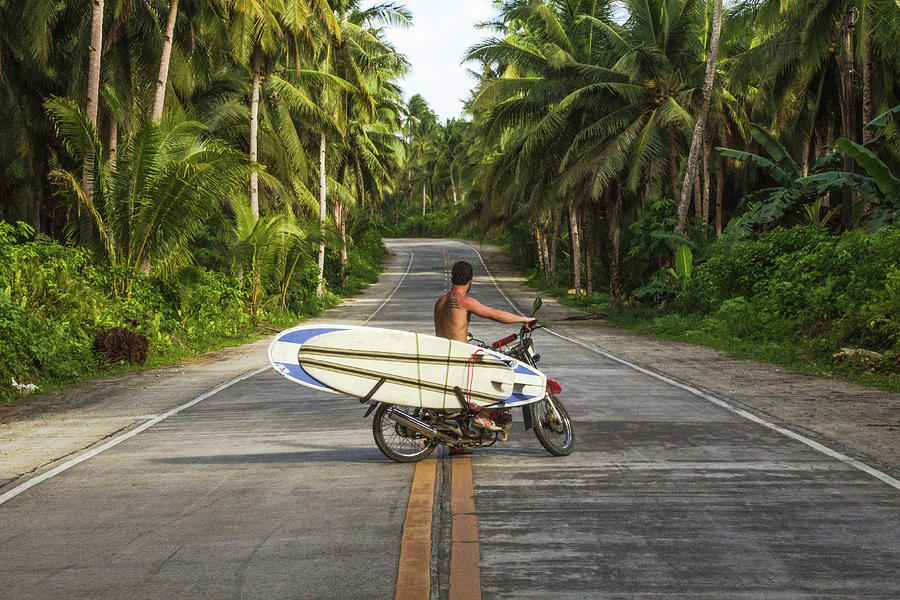 Man Riding Motorcycle With Surfboards In Coconut Road Palms Philippine ...