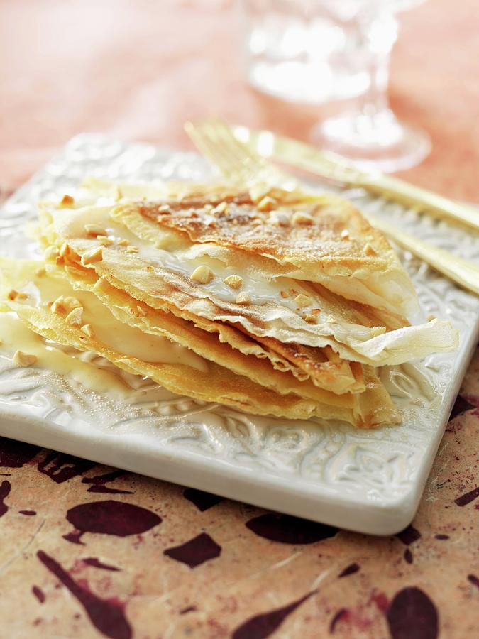 Pastilla With Milk Sauce And Almonds Photograph by Hall - Pixels