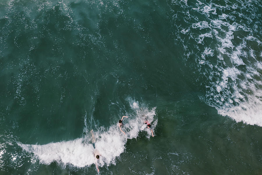 People Swim In Ocean Waves In The Summer In Swimsuit Photograph By Cavan Images Anna Rasmussen
