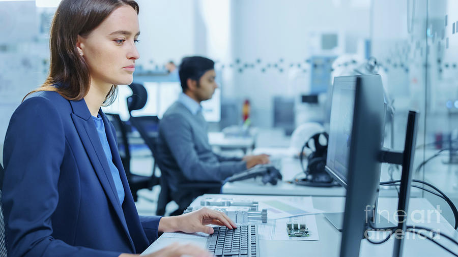 Portrait Of Engineer Working On A Computer Photograph by Gorodenkoff ...