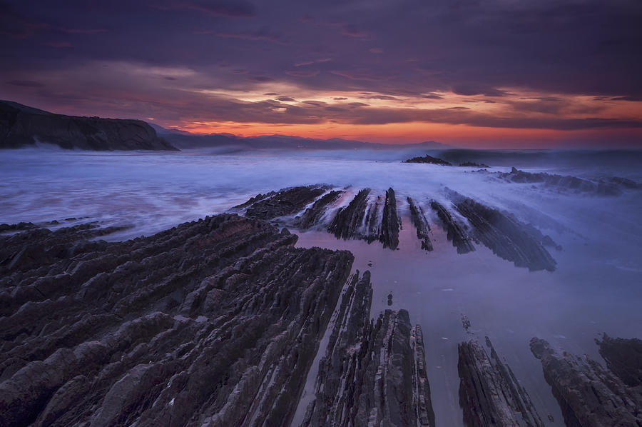Puesta De Sol Entre Mar Y Rocas Photograph by Mikel Lastra - Pixels