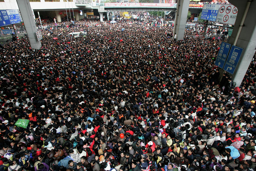 Stranded Train Passengers Wait Photograph by Bobby Yip - Fine Art America