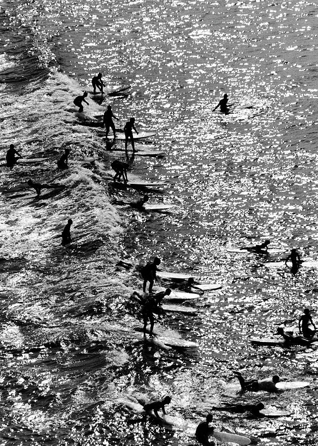 Surf riders surfing. Photograph by Allan Grant - Fine Art America