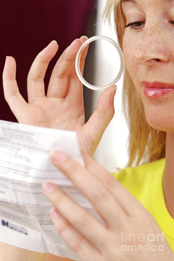 Woman Reading Female Condom Information Photograph By Lea Patersonscience Photo Library Pixels
