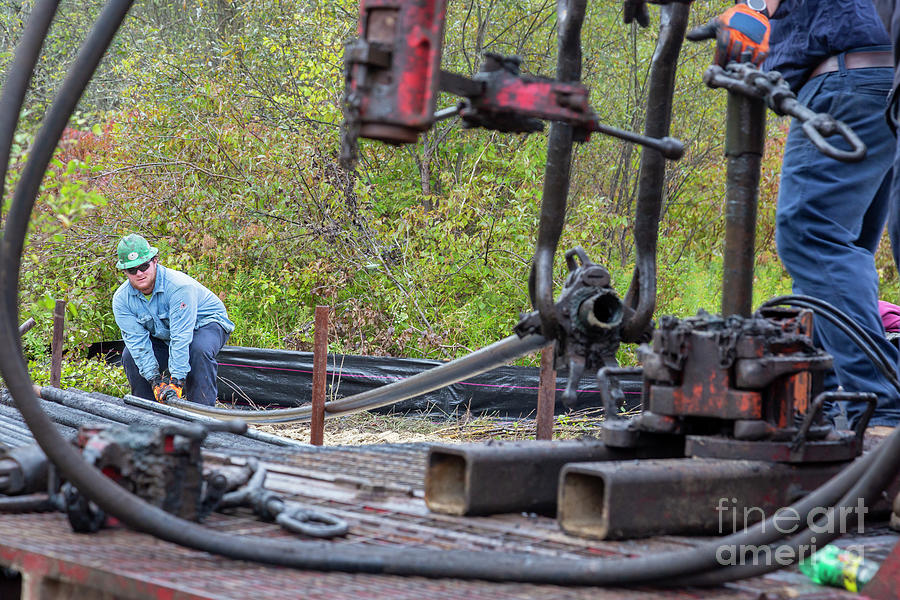 Workers Plugging An Abandoned Oil Well by Science Photo Library