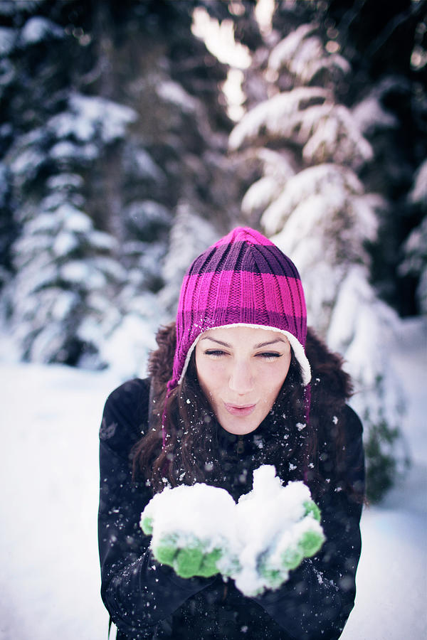 Young Woman Blowing Snow Photograph by Cavan Images - Fine Art America