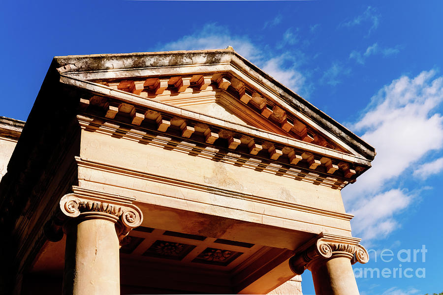 A portico with columns and a triangular pediment on the Greek-st Photograph by Joaquin Corbalan ...