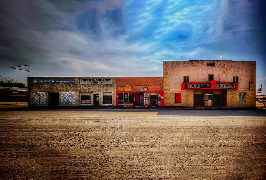 Dramatic Light over Historic Downtown Freer, Texas Photograph by Reuben ...