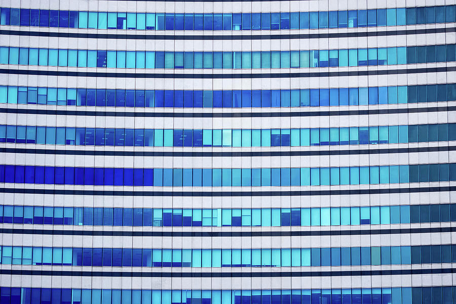 Tall building facade windows front view. Green windows facade of #1 ...