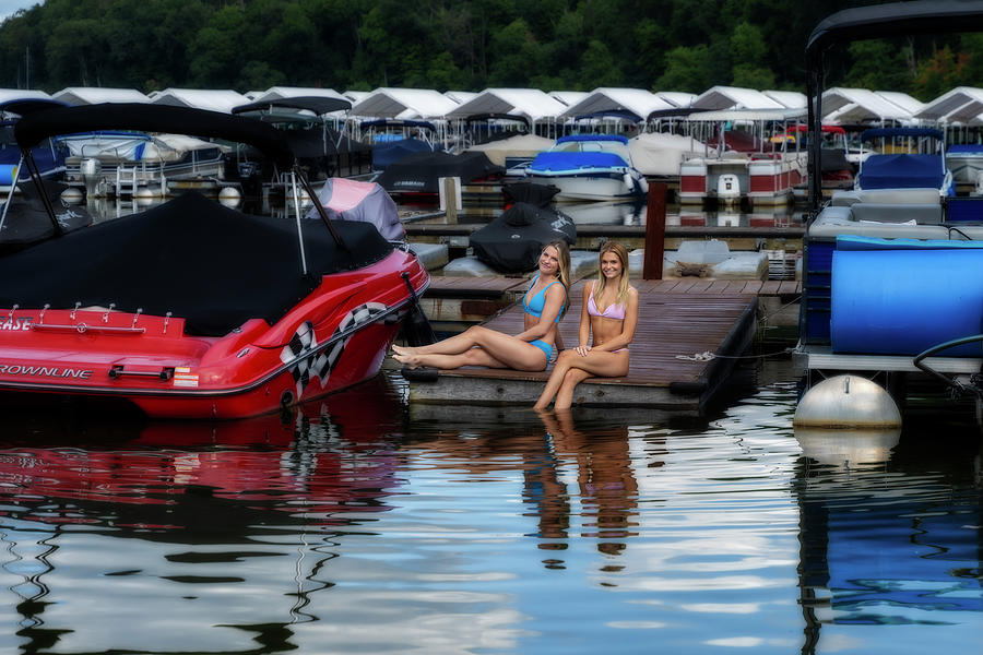 Two beautiful young ladies at a boat marina in swim suits Photograph by Dan Friend - Fine Art ...