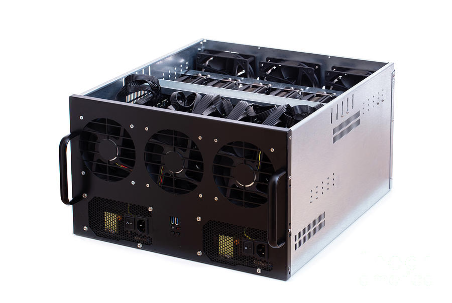 Bitcoin and cryptocurrency miner - a mining computer isolated on white ...