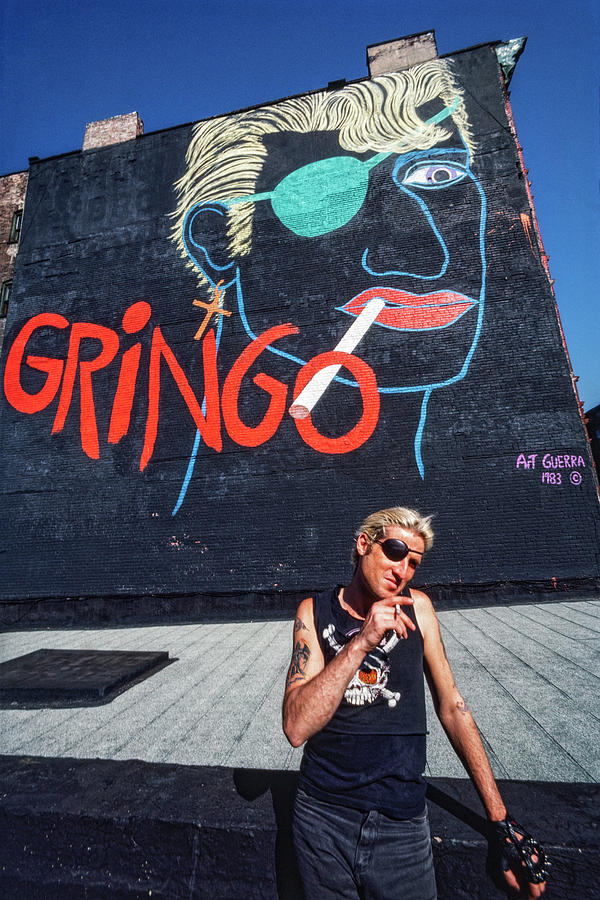 1980s - John Spacely in front of Gringo mural by Art Guerra, St Marks Place, East Village, New ...